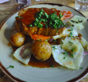 REVIEW -Den Glade Gris - Oslo, NO - Candid Travel Companion